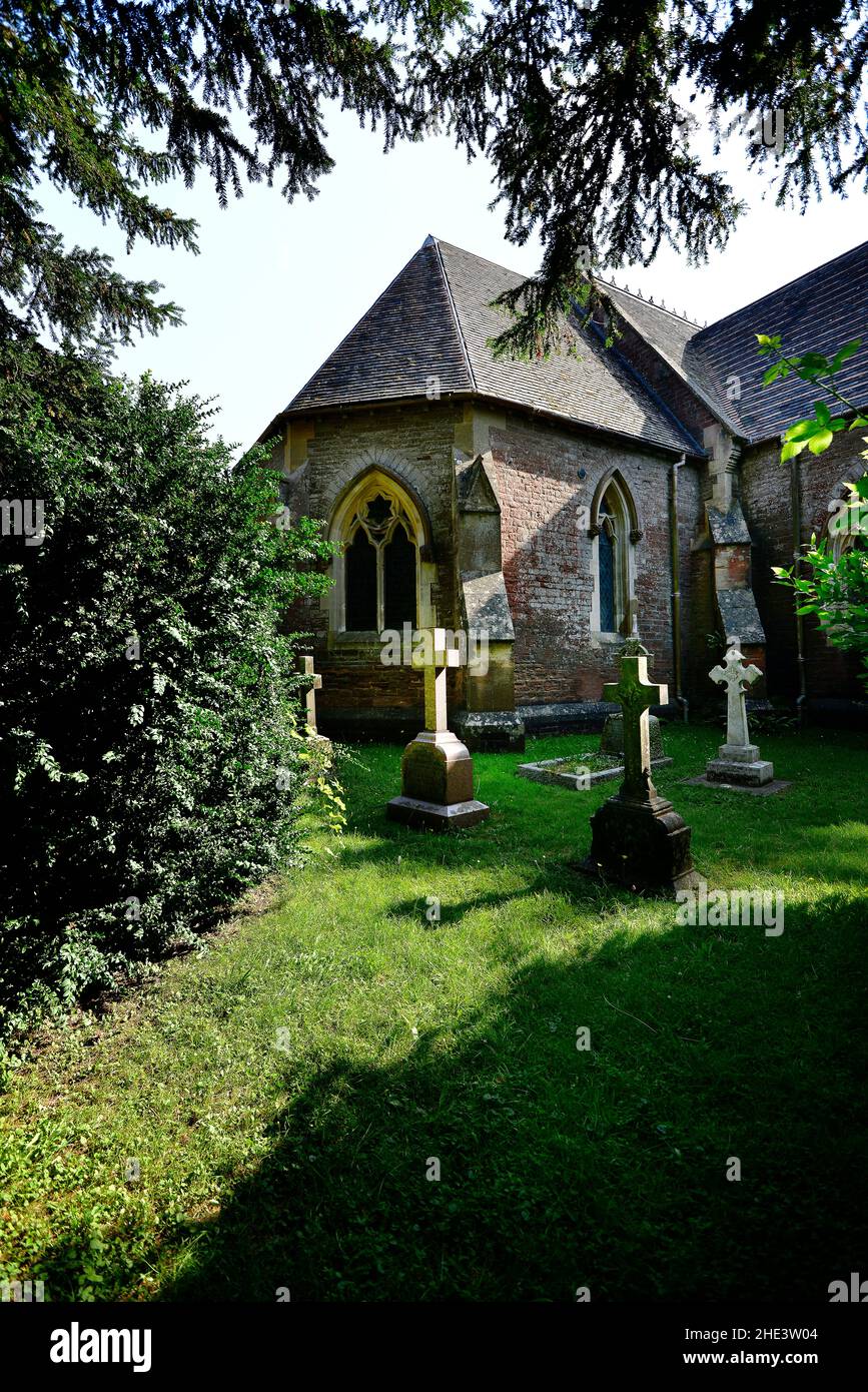 Christ Church is a 19th century building set above a road, in a ...