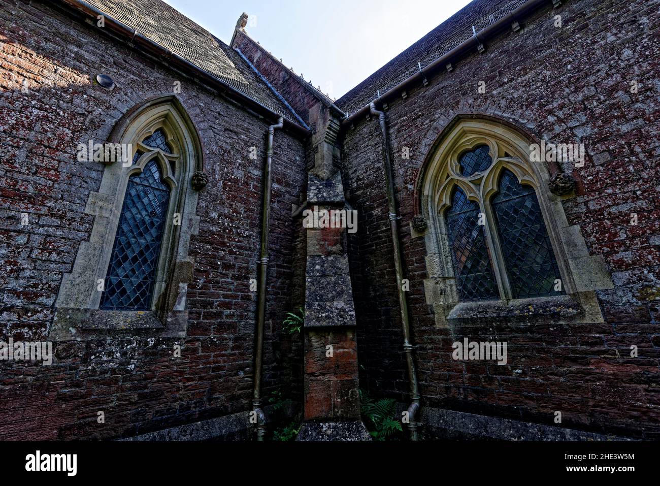 Christ Church is a 19th century building set above a road, in a ...