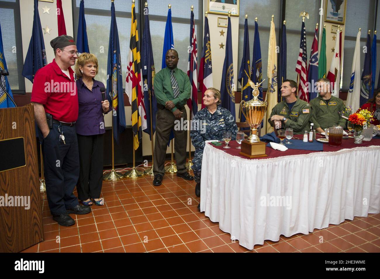 Ronald Saunders, left, and his mother Dianne Hines, second from the ...
