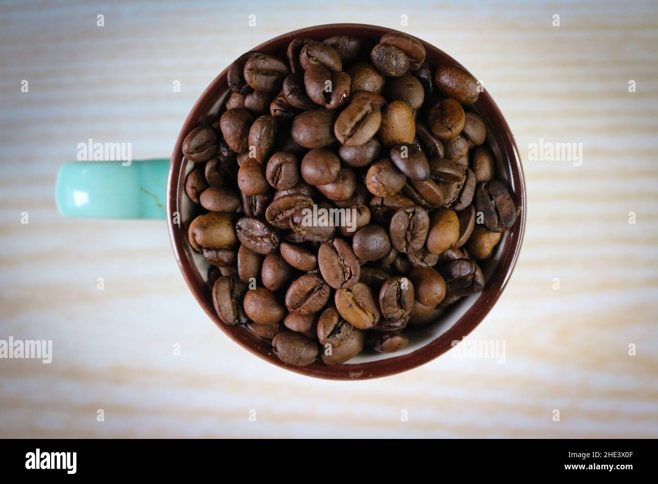 Cup of coffee beans Stock Photo - Alamy
