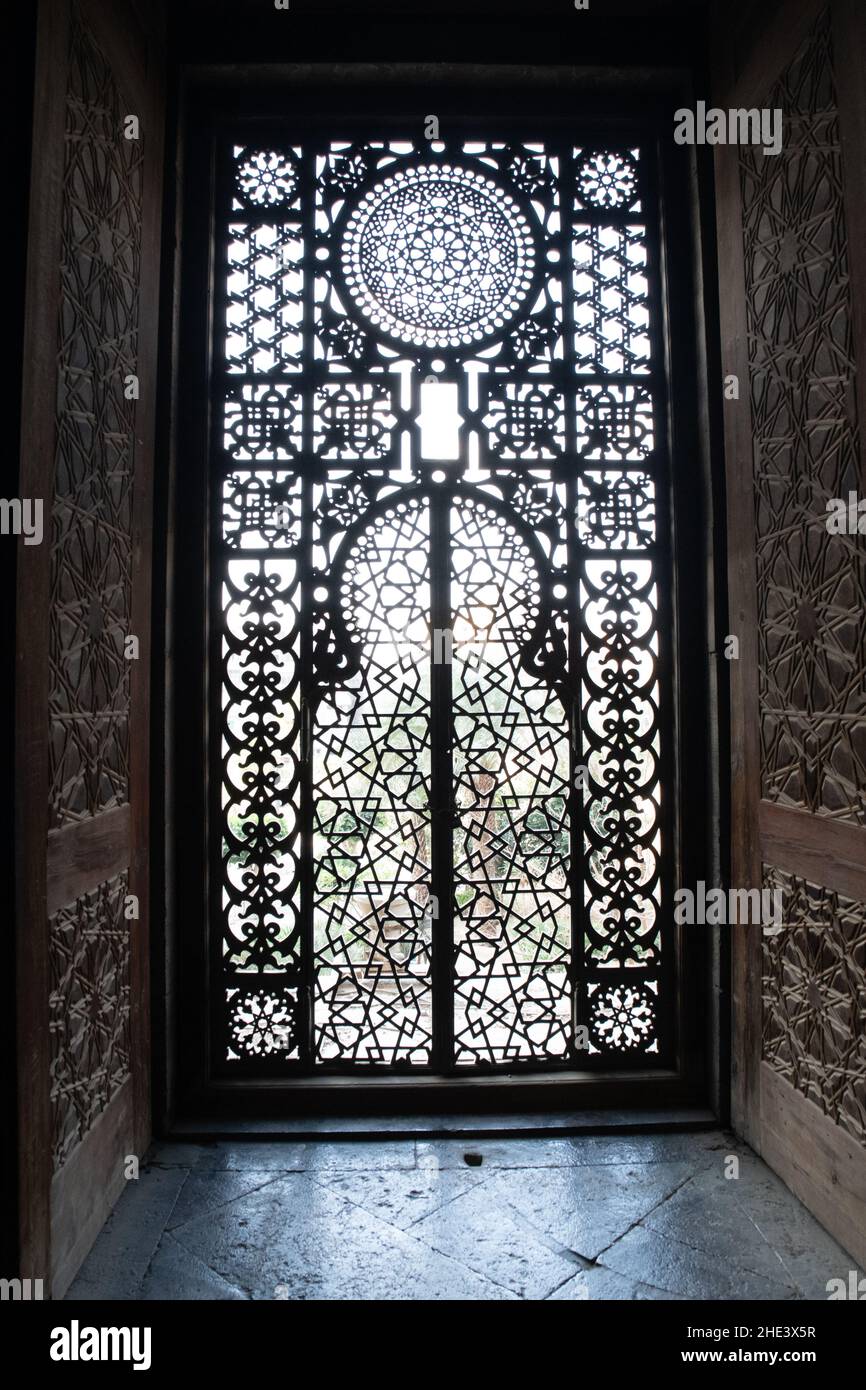 Beautiful ornate metal latticework that lets light into the mausoleum ...