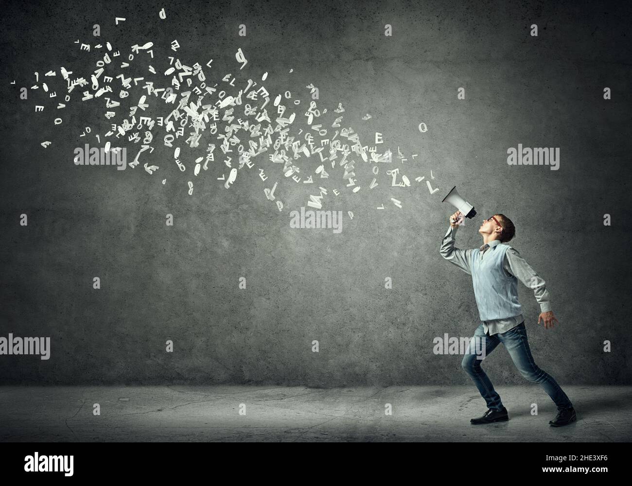 Boy with megaphone Stock Photo - Alamy