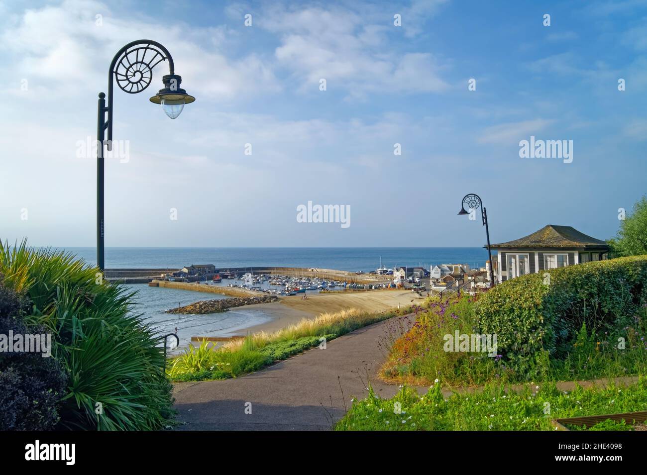 UK, Dorset, Lyme Regis, The Harbour from Langmoor Gardens Stock Photo ...