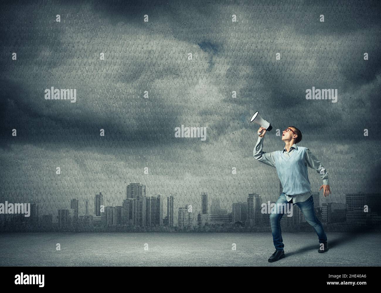 Boy with megaphone Stock Photo - Alamy