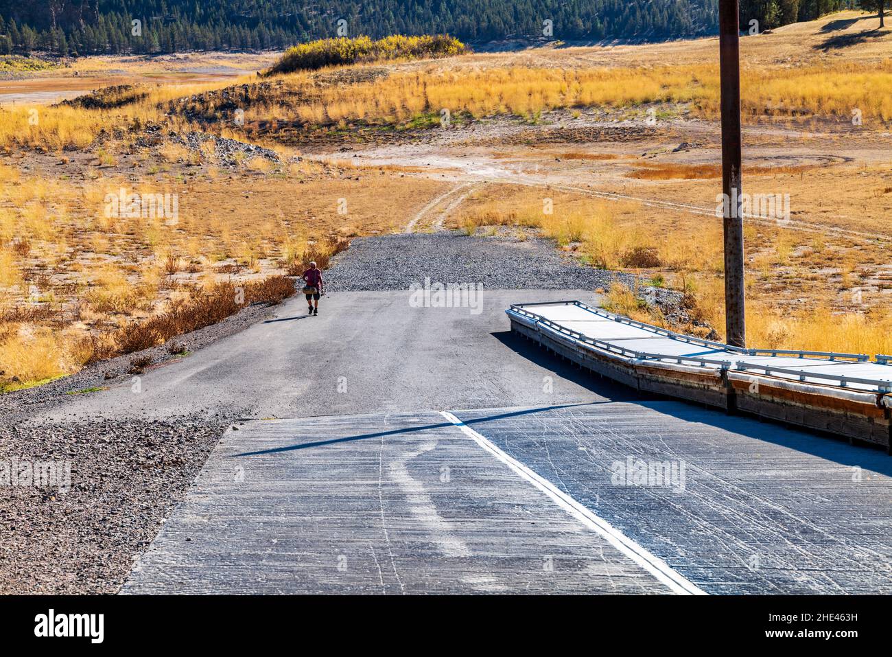 Fisherman walking up from extremely low & drought stricken Ochoco ...