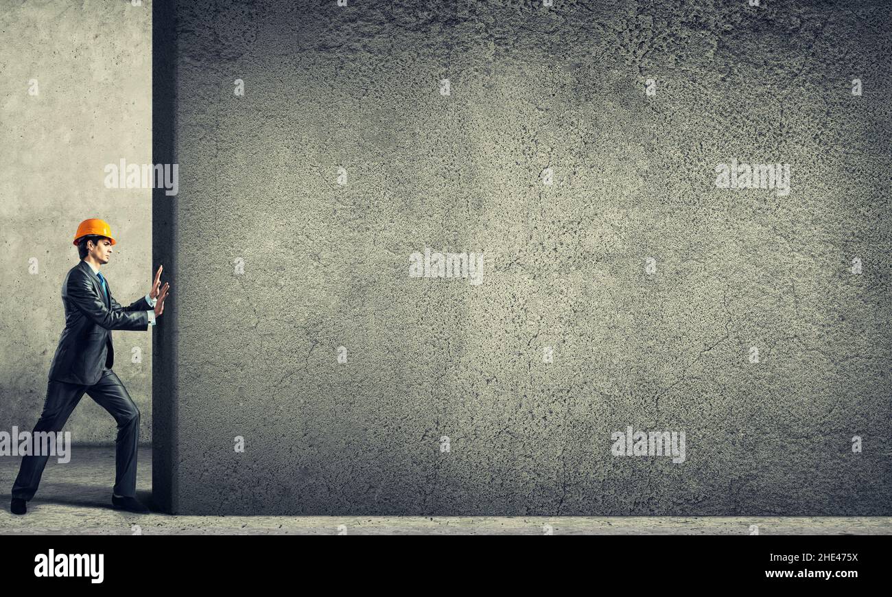 Construction man and cement banner Stock Photo - Alamy