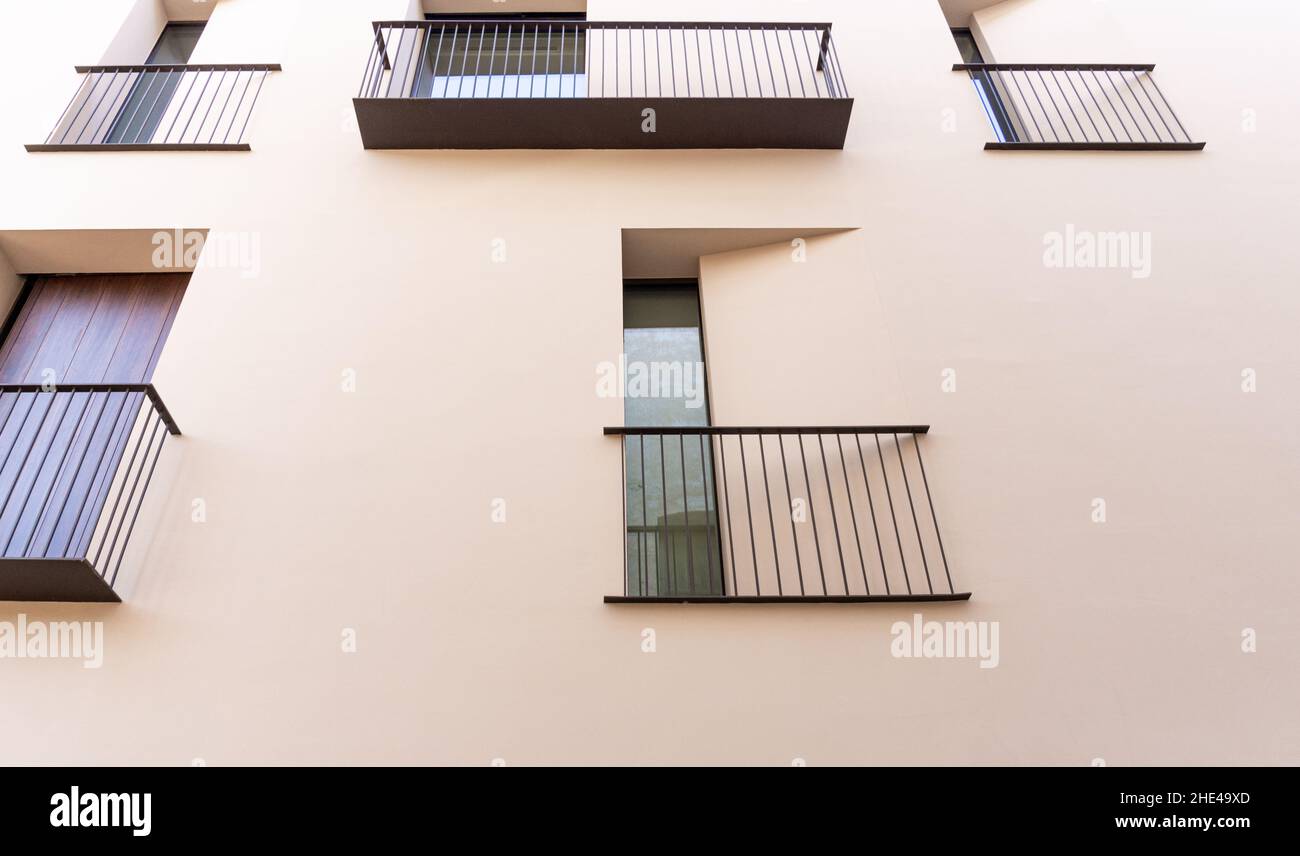 Close-up shot of balconies and metal windows with straight lines Stock ...