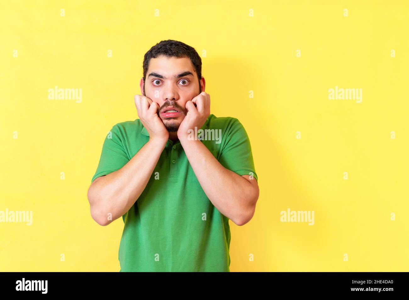 Scared young man. Portrait of nervous guy gestures in panic, isolated ...