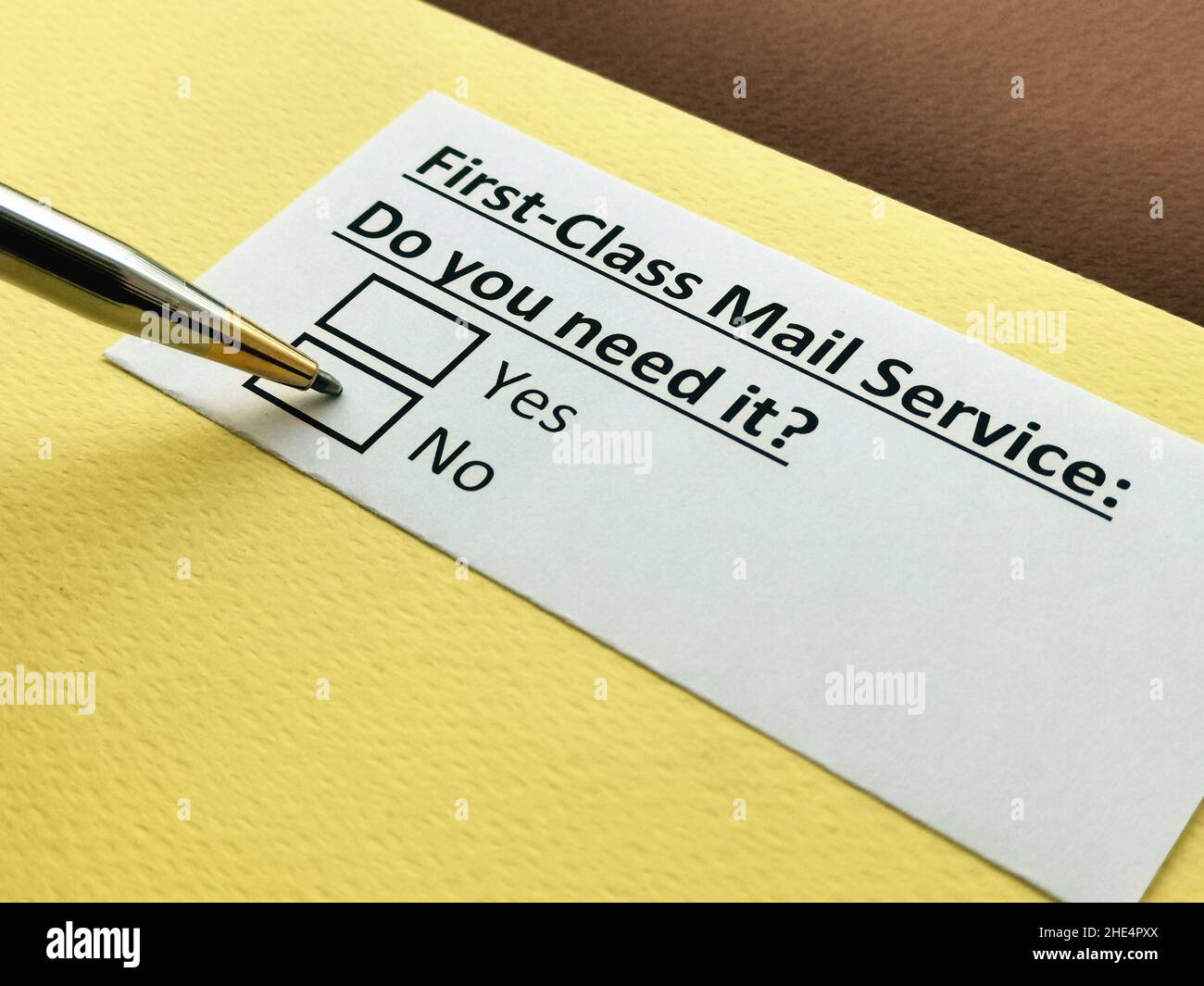 One person is answering question about first class mail service Stock ...