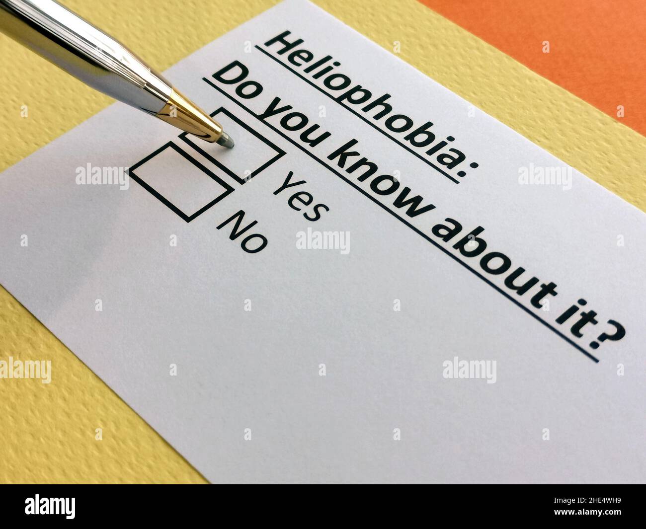 One person is answering question about heliophobia Stock Photo - Alamy