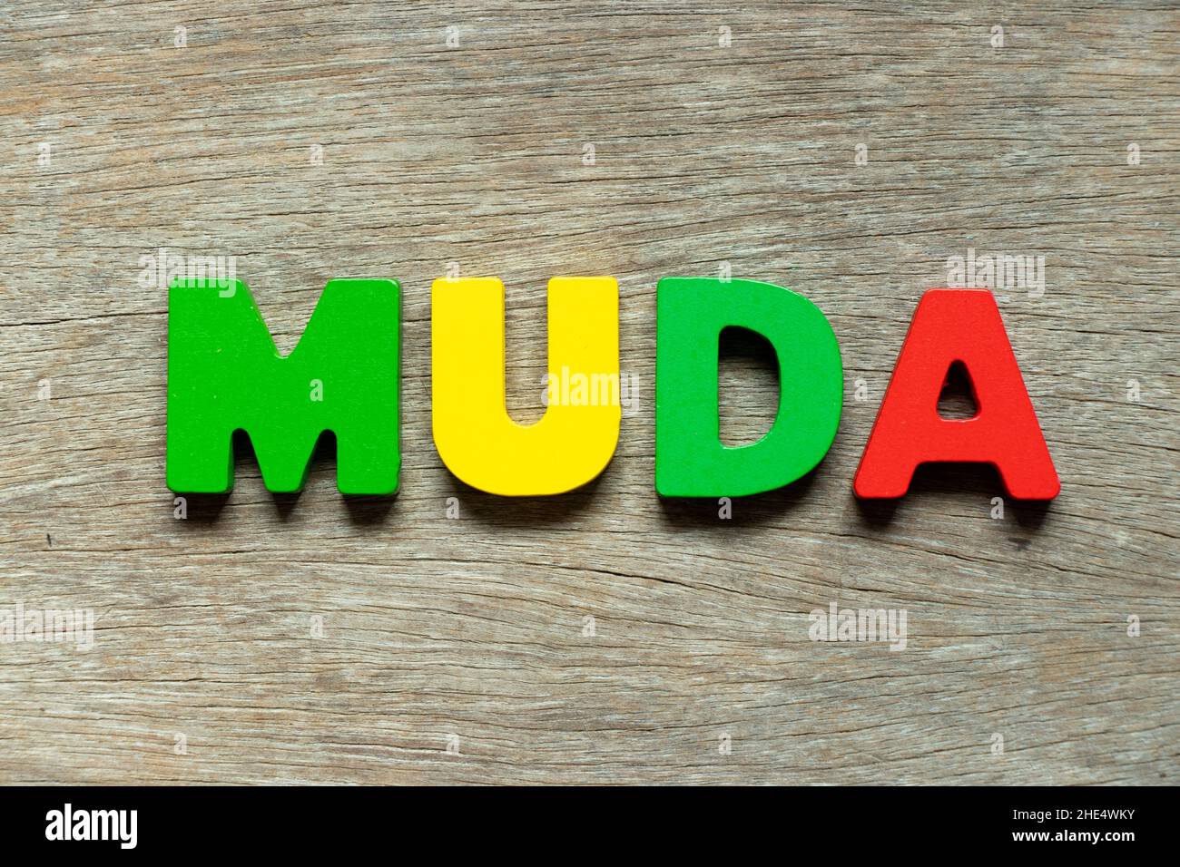 Color alphabet letter in word muda on wood background Stock Photo - Alamy
