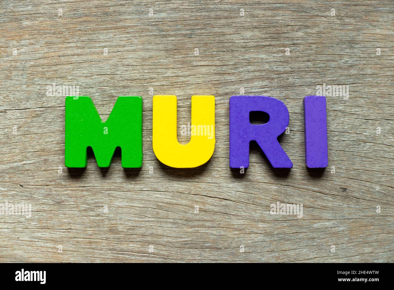 Color alphabet letter in word muri on wood background Stock Photo - Alamy