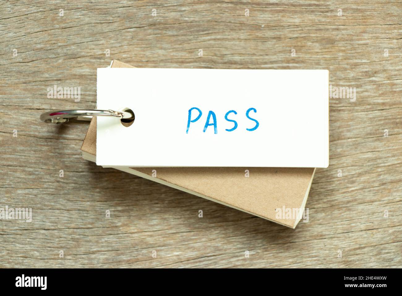 Flash card with handwriting word pass on wood background Stock Photo ...