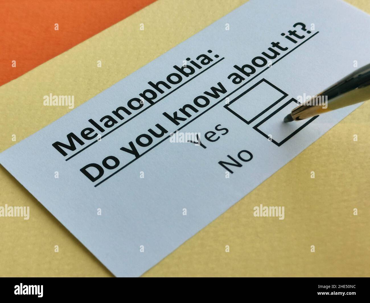 One person is answering question about melanophobia Stock Photo - Alamy