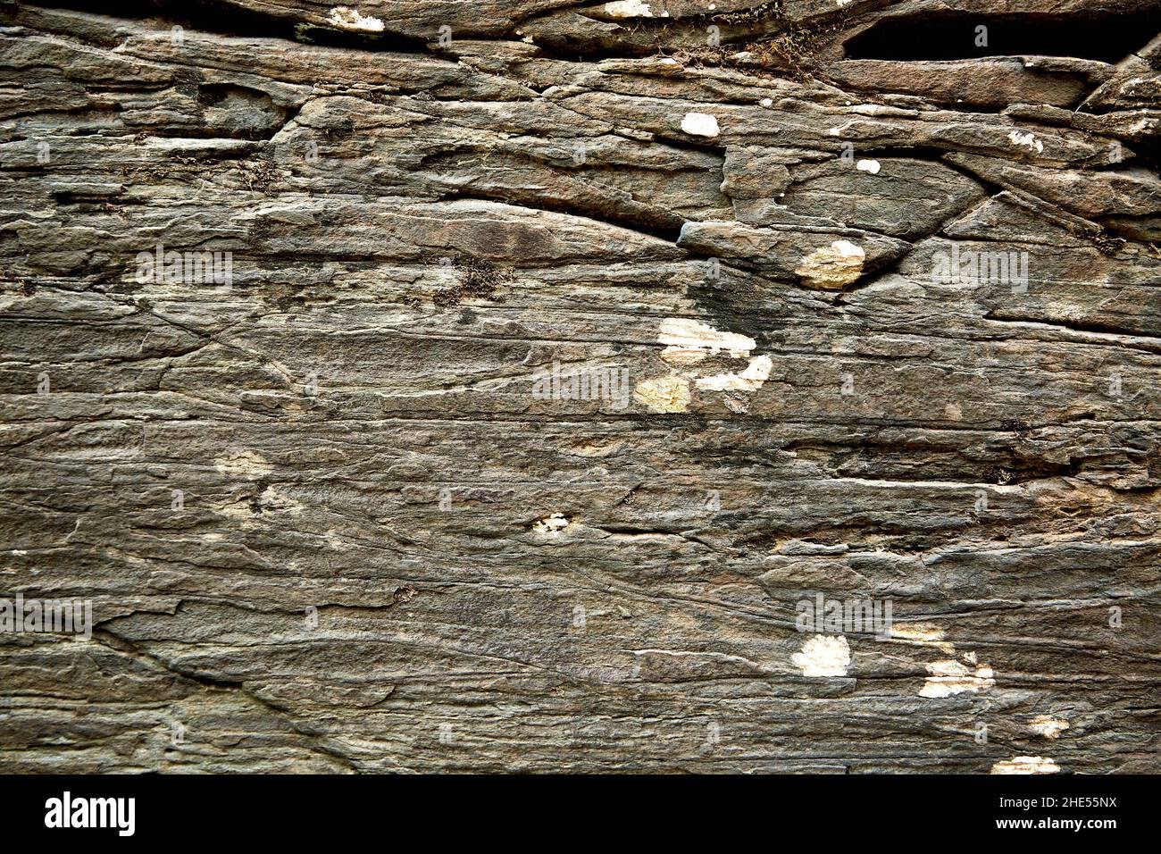 Layers and Cracks in Stone Face, Front View Stock Photo - Alamy