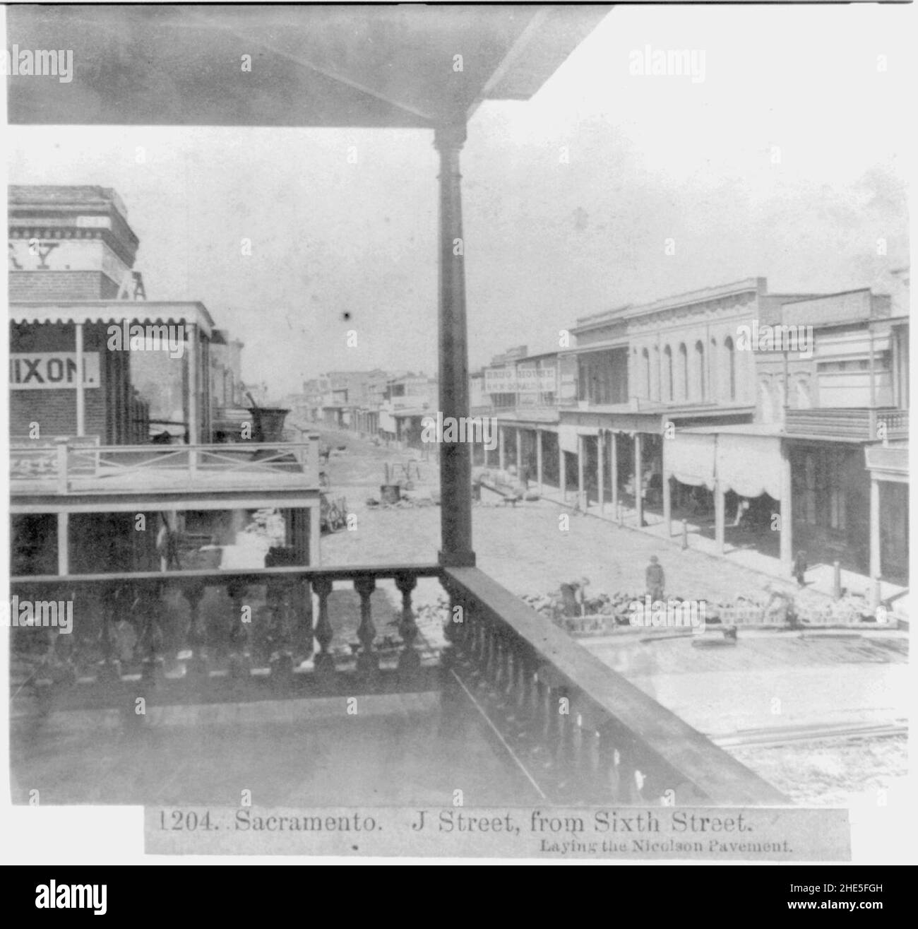 Sacramento - J Street from Sixth Street, laying the Nicolson Pavement ...
