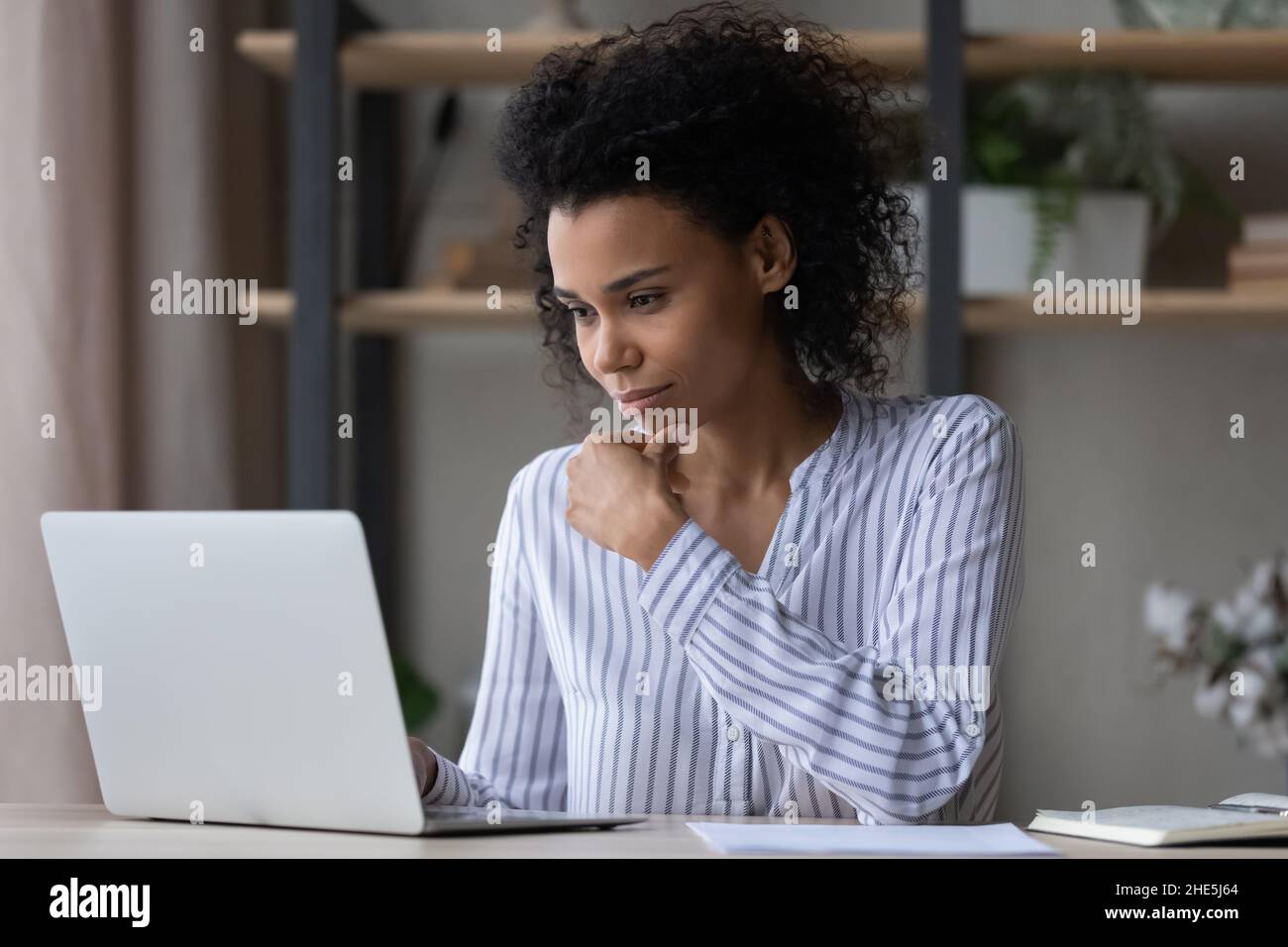 African lady working on laptop hi-res stock photography and images - Alamy