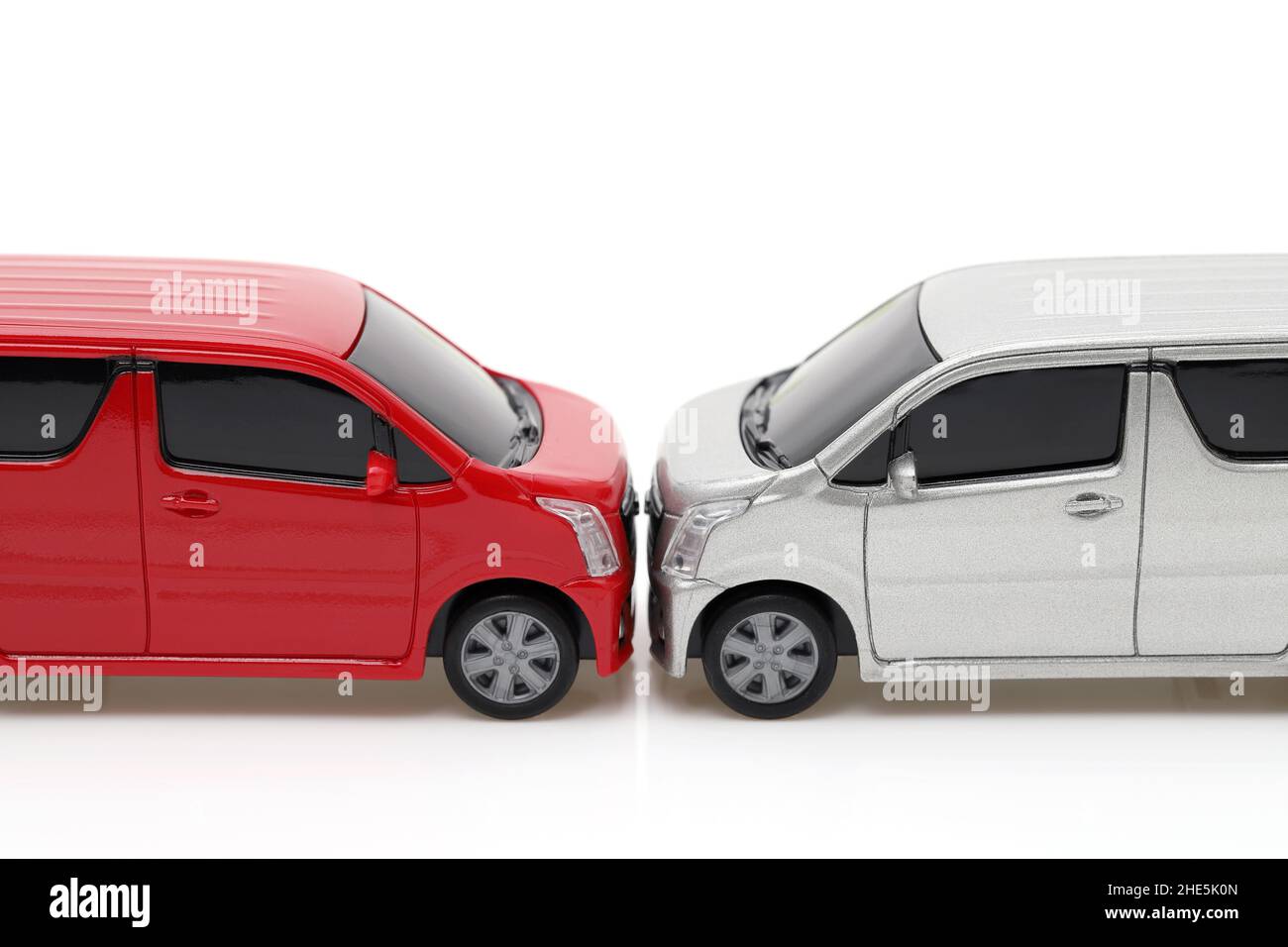 Toy cars crash accident, Red car and silver car on white background ...