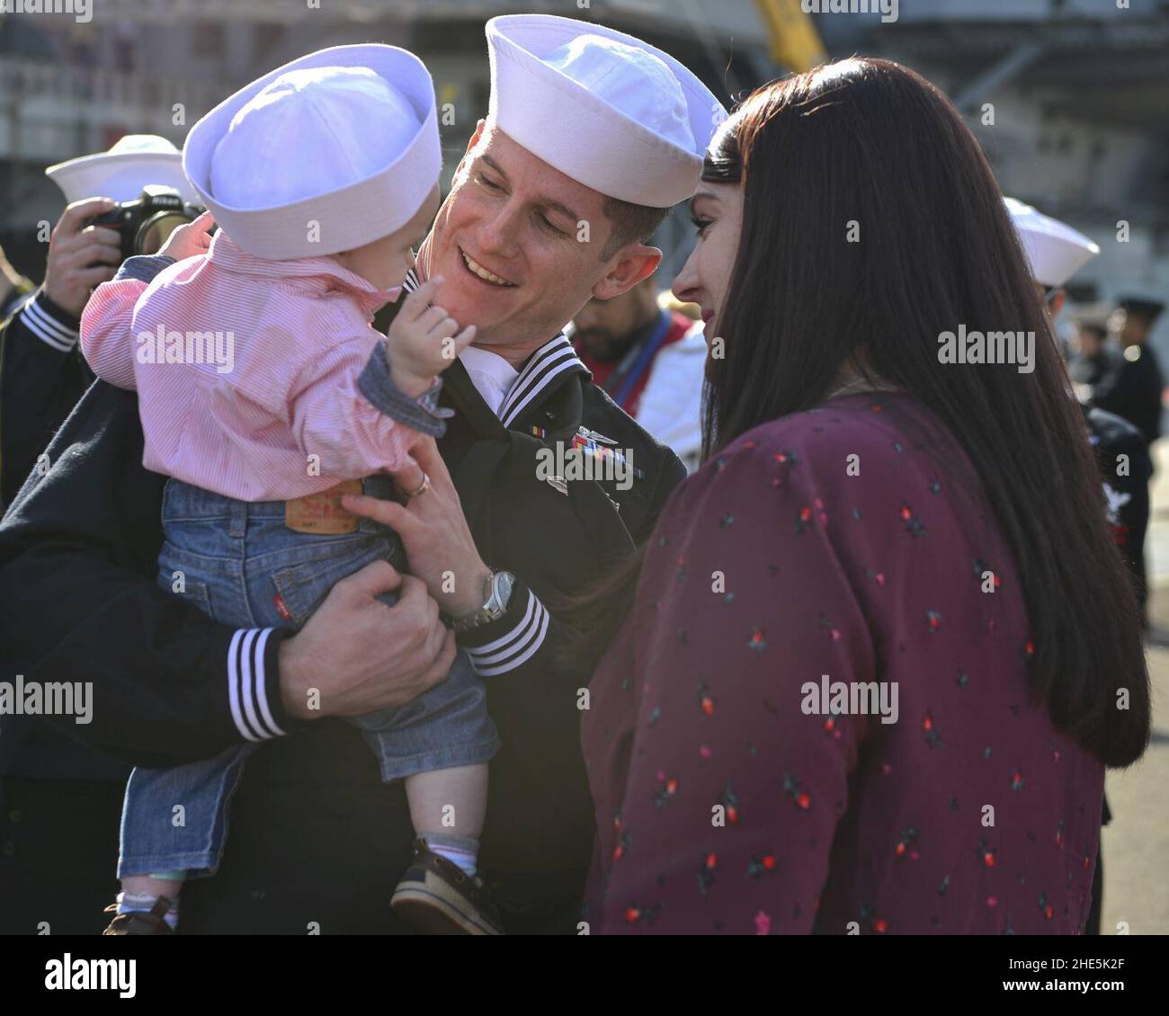 Sailor meets his daughter for the first time. (24008927677 Stock Photo ...
