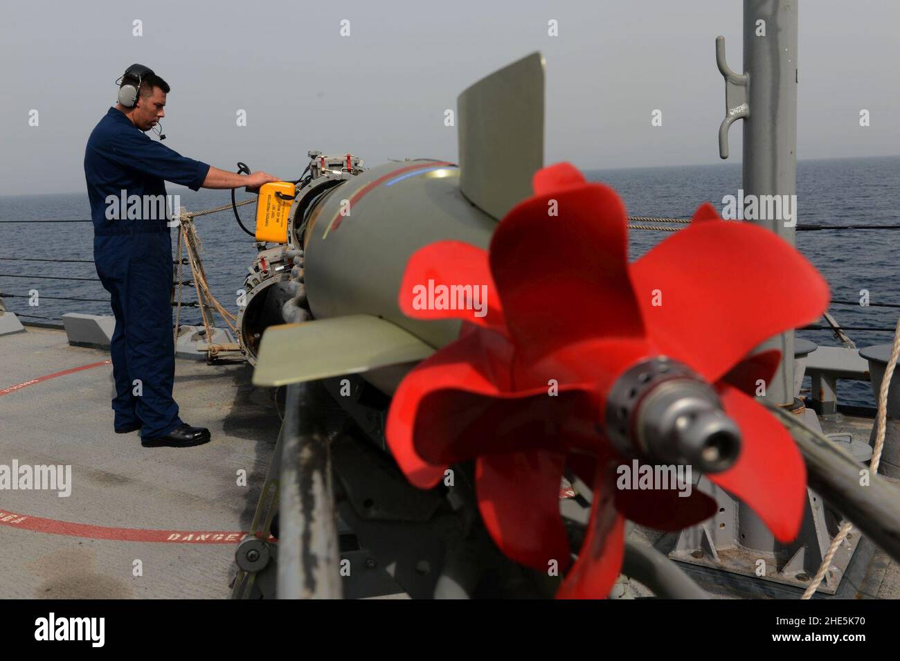 Sailor prepares surface vessel torpedo tube launcher. (9191429567 Stock ...