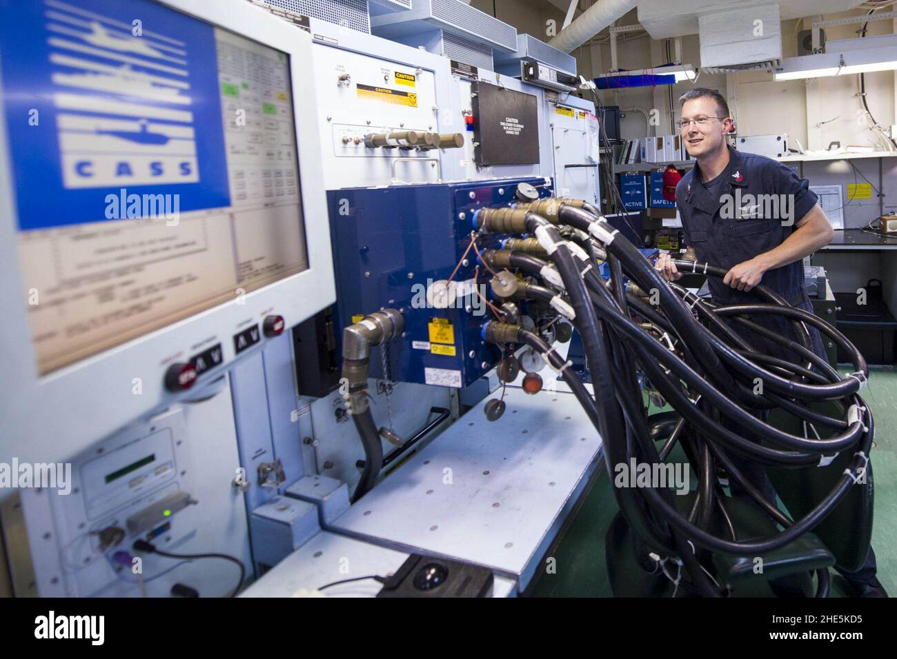 Sailor troubleshoots the Consolidated Automatic Support System in the ...