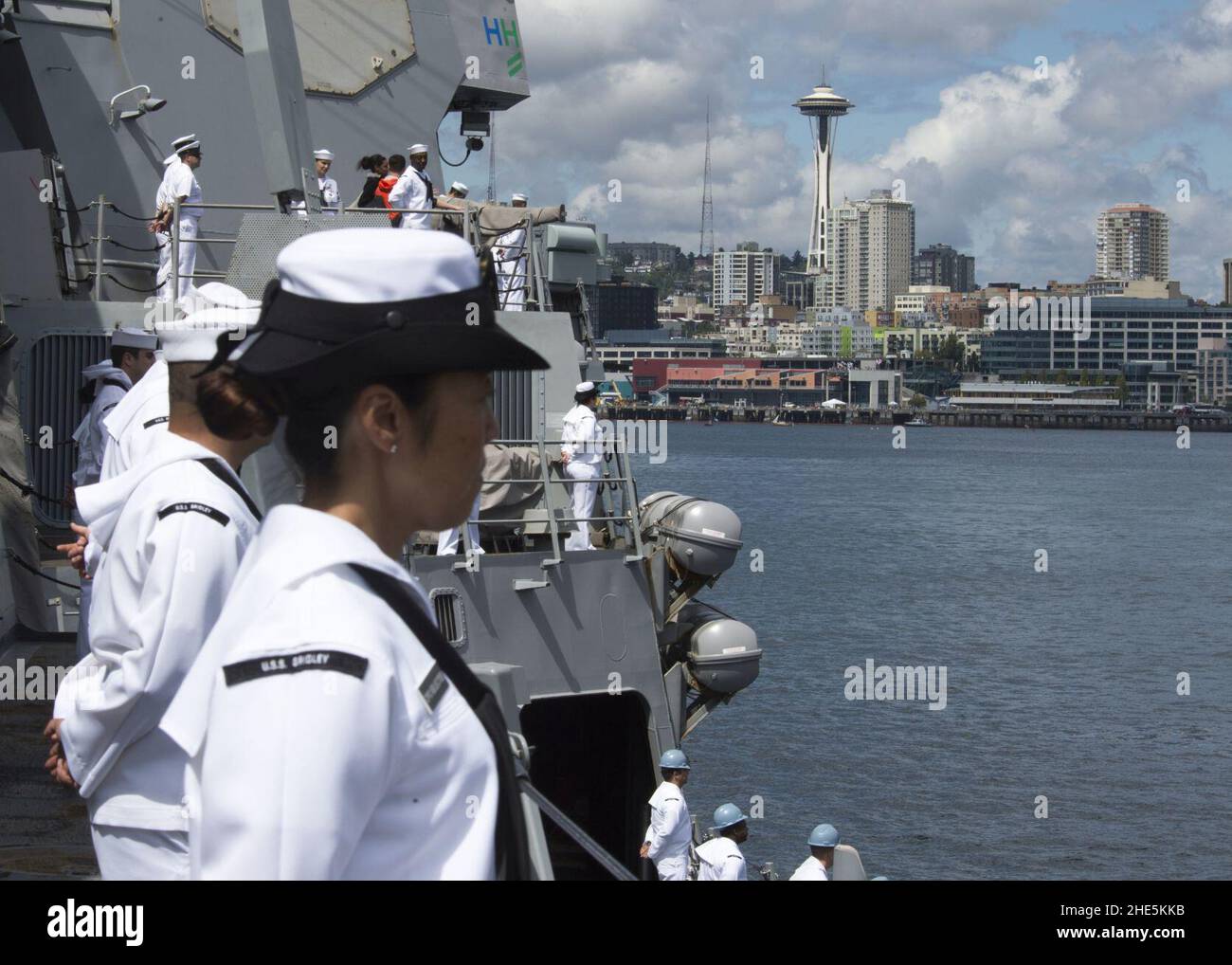Sailors aboard USS Gridley man the rails as the ship arrives in Seattle ...