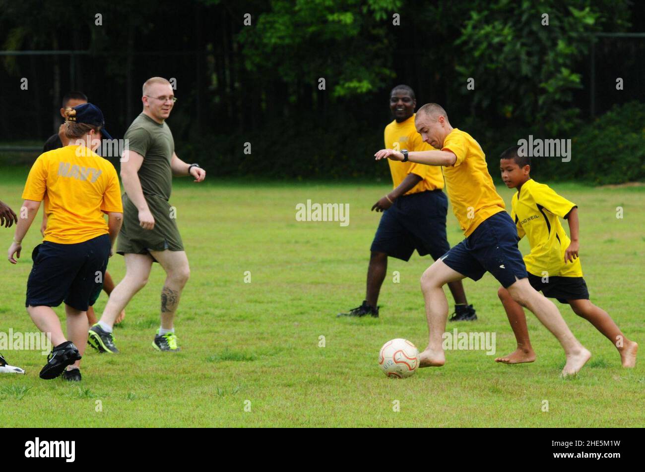Sailors and Marines play football with children in Thailand 110504 ...
