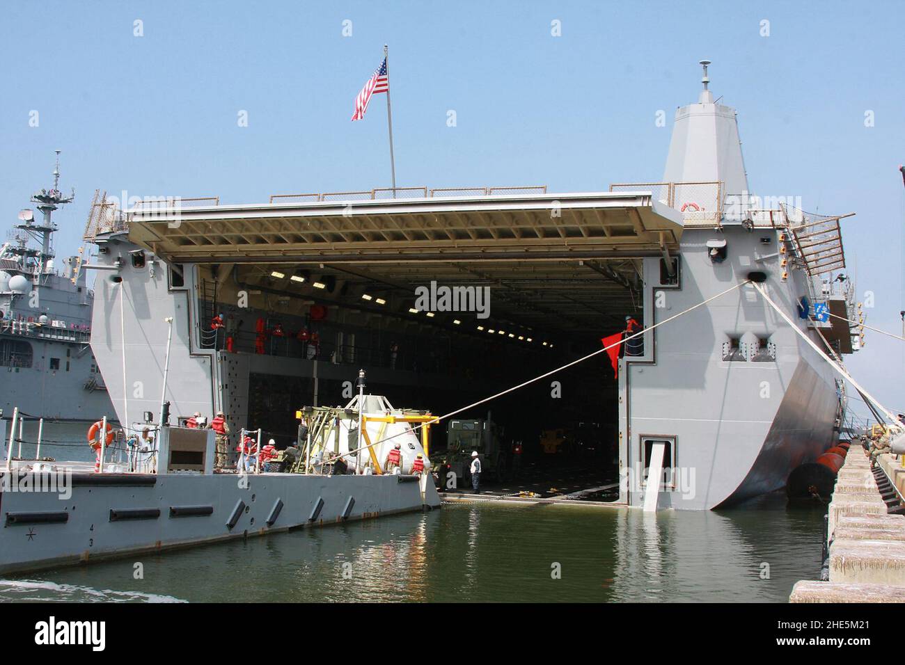 Sailors and NASA engineers prepare to conduct a Stationary (in port ...