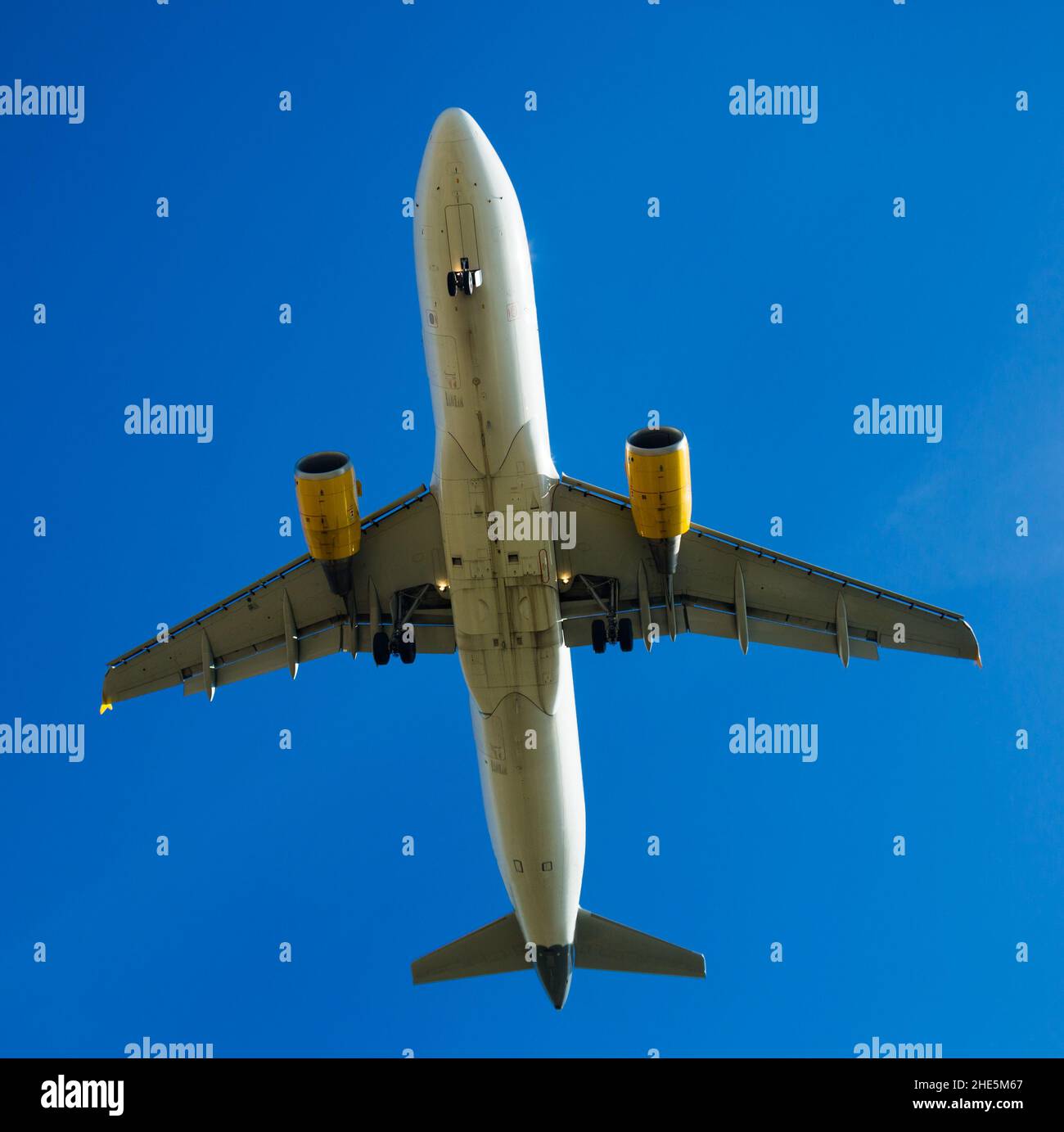 Passenger plane departing in afternoon Stock Photo - Alamy