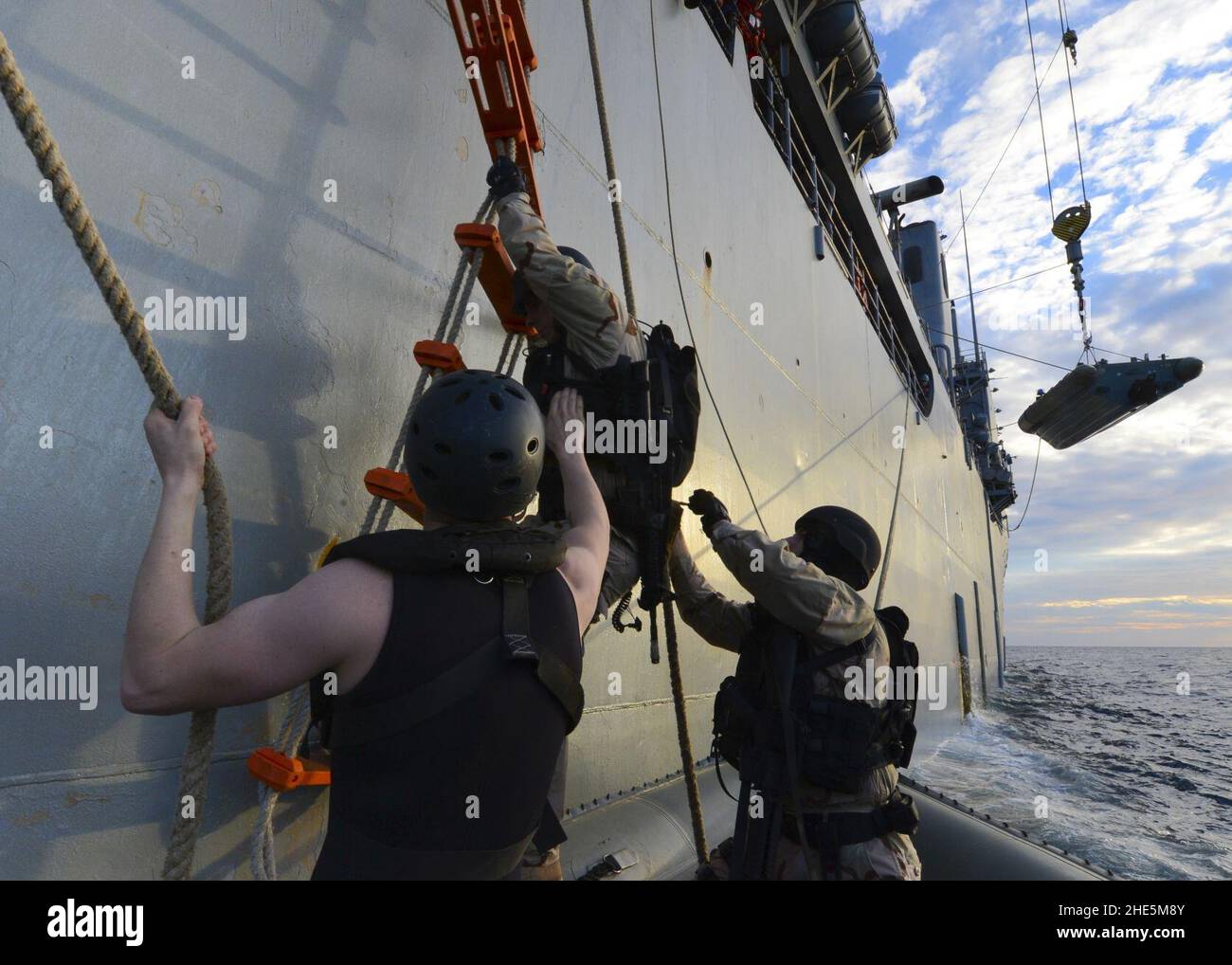 Sailors board a RHIB from USS Carter Hall. (8467234539 Stock Photo - Alamy