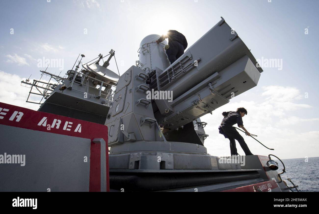 Sailors clean the SEARAM close-in weapons system aboard USS Porter ...
