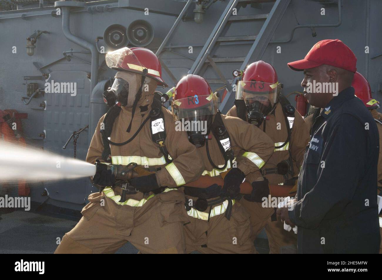 Sailors conduct firefighting training. (8246657169 Stock Photo - Alamy