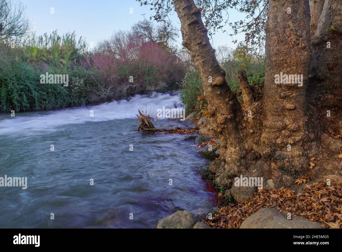 Sunset view of cascade the origin point of the Jordan river, were the ...