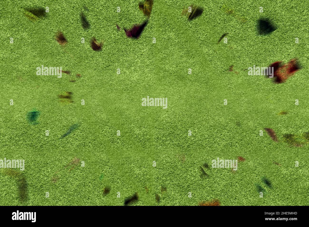 Colorful confetti with green grass background Stock Photo - Alamy