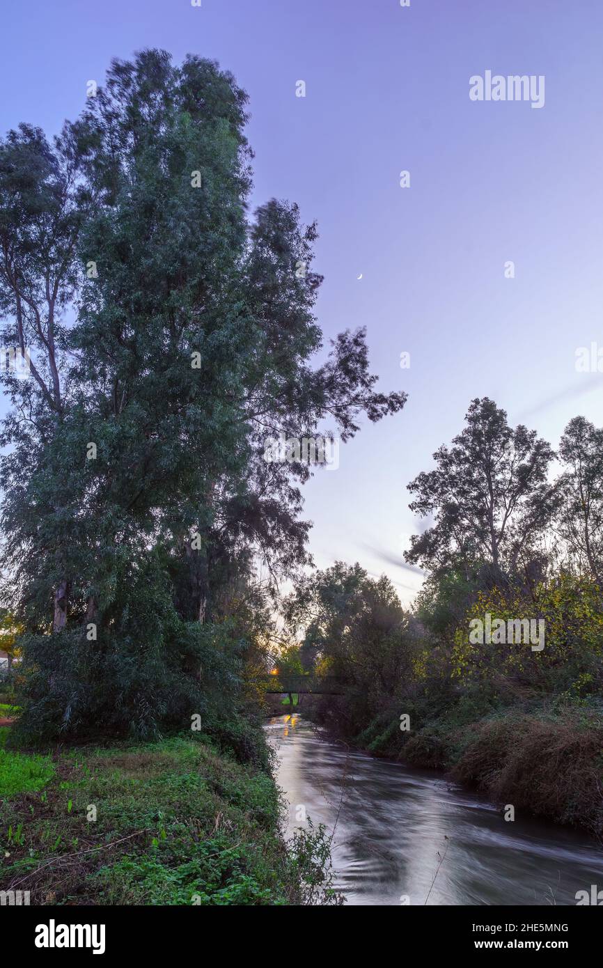 Sunset view of the origin point of the Jordan river, were the streams ...