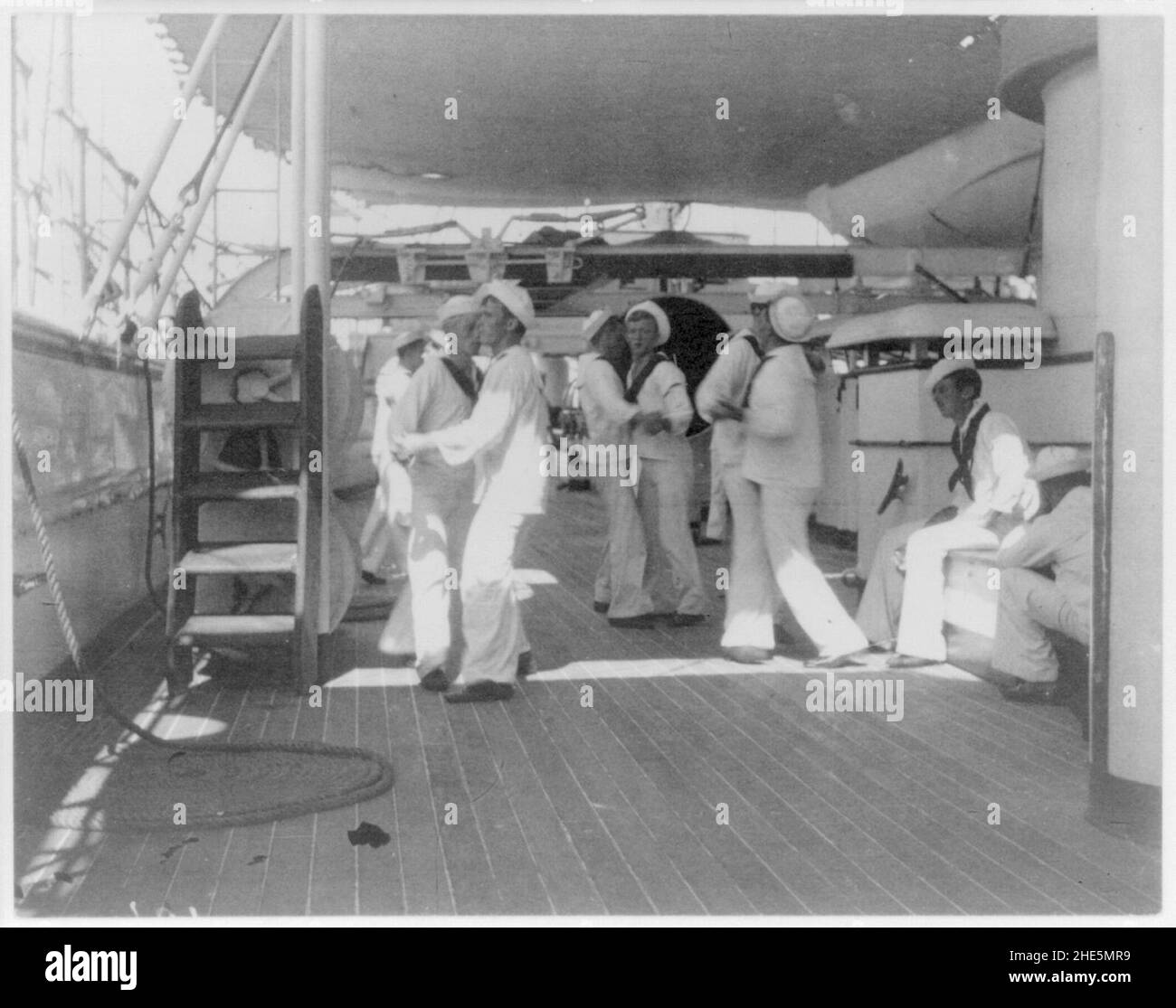 Sailors dancing with each other aboard USS OLYMPIA Stock Photo - Alamy