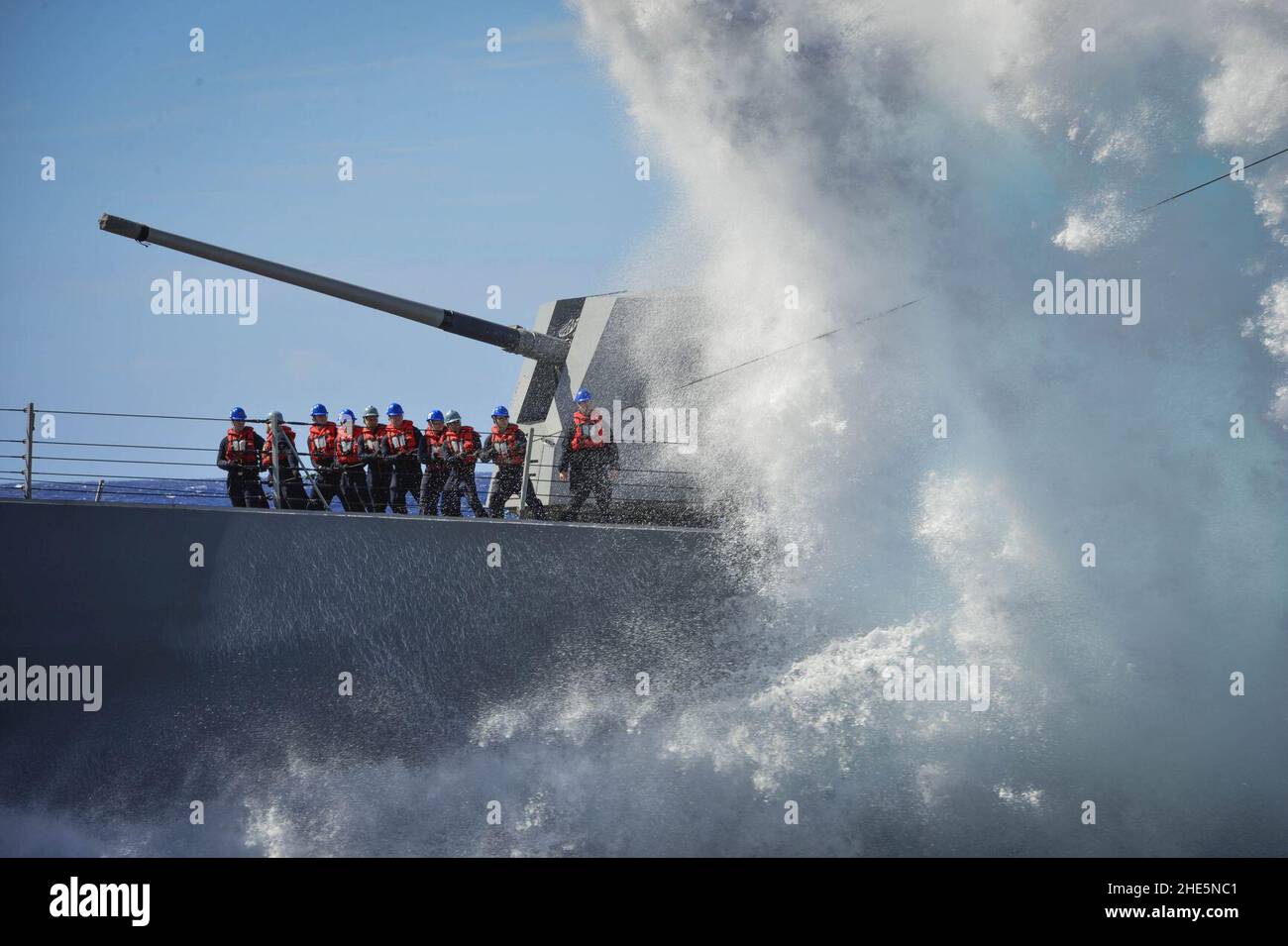 Sailors handle line during a fueling-at-sea with USS Theodore Roosevelt ...
