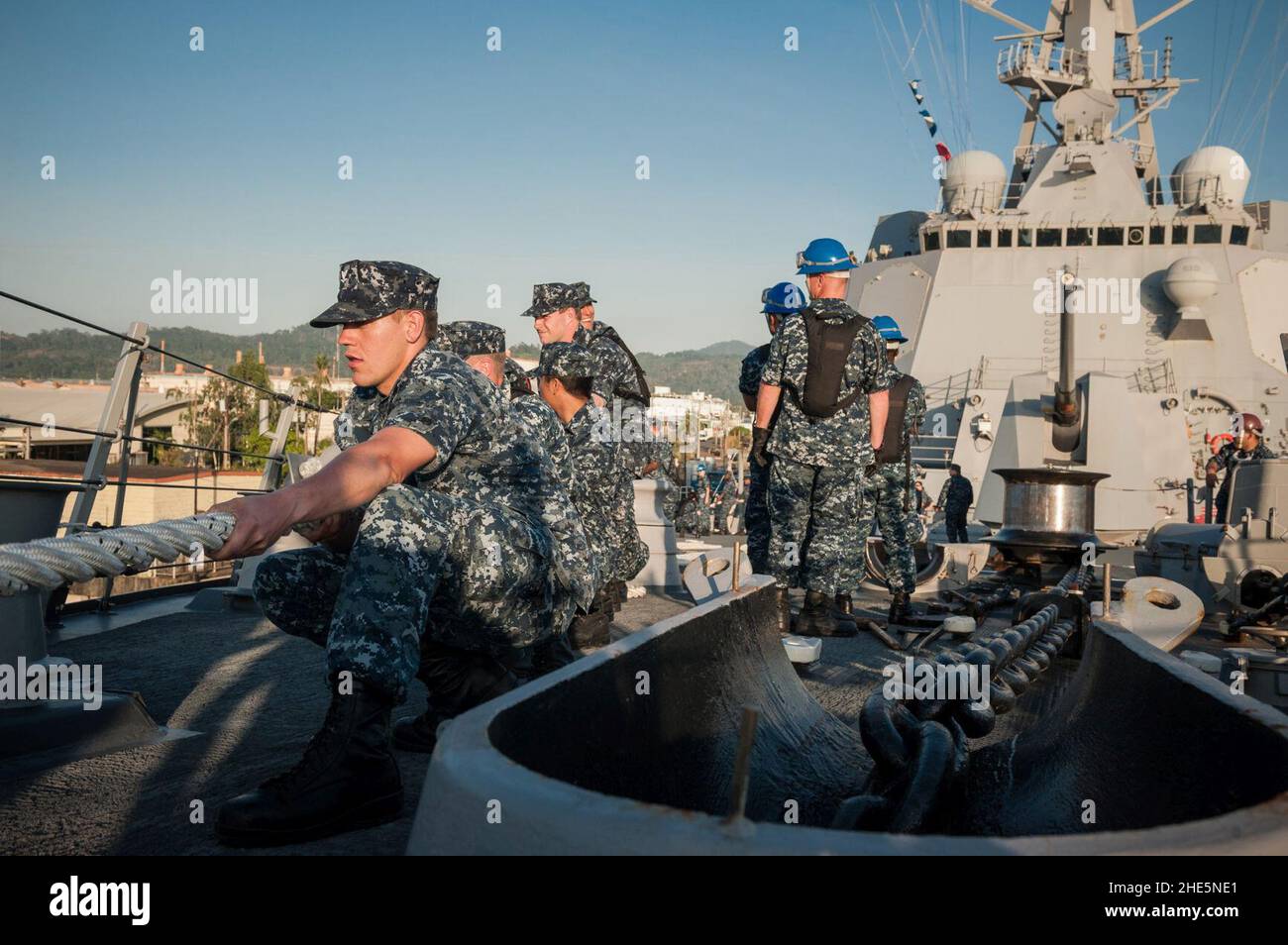 Sailors handle mooring lines aboard USS Stockdale. (8456180632 Stock ...
