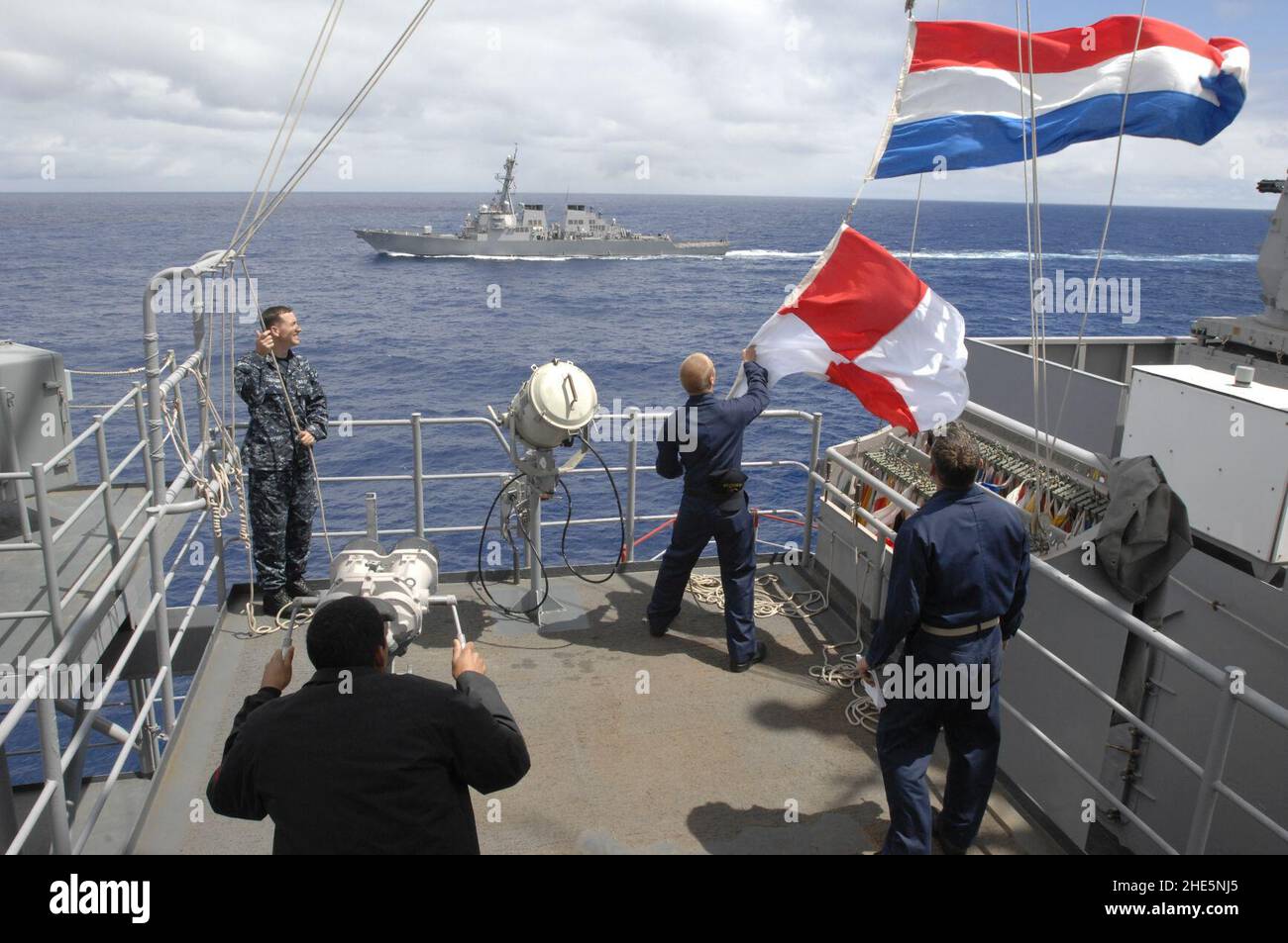 Hoisting flags hi-res stock photography and images - Alamy