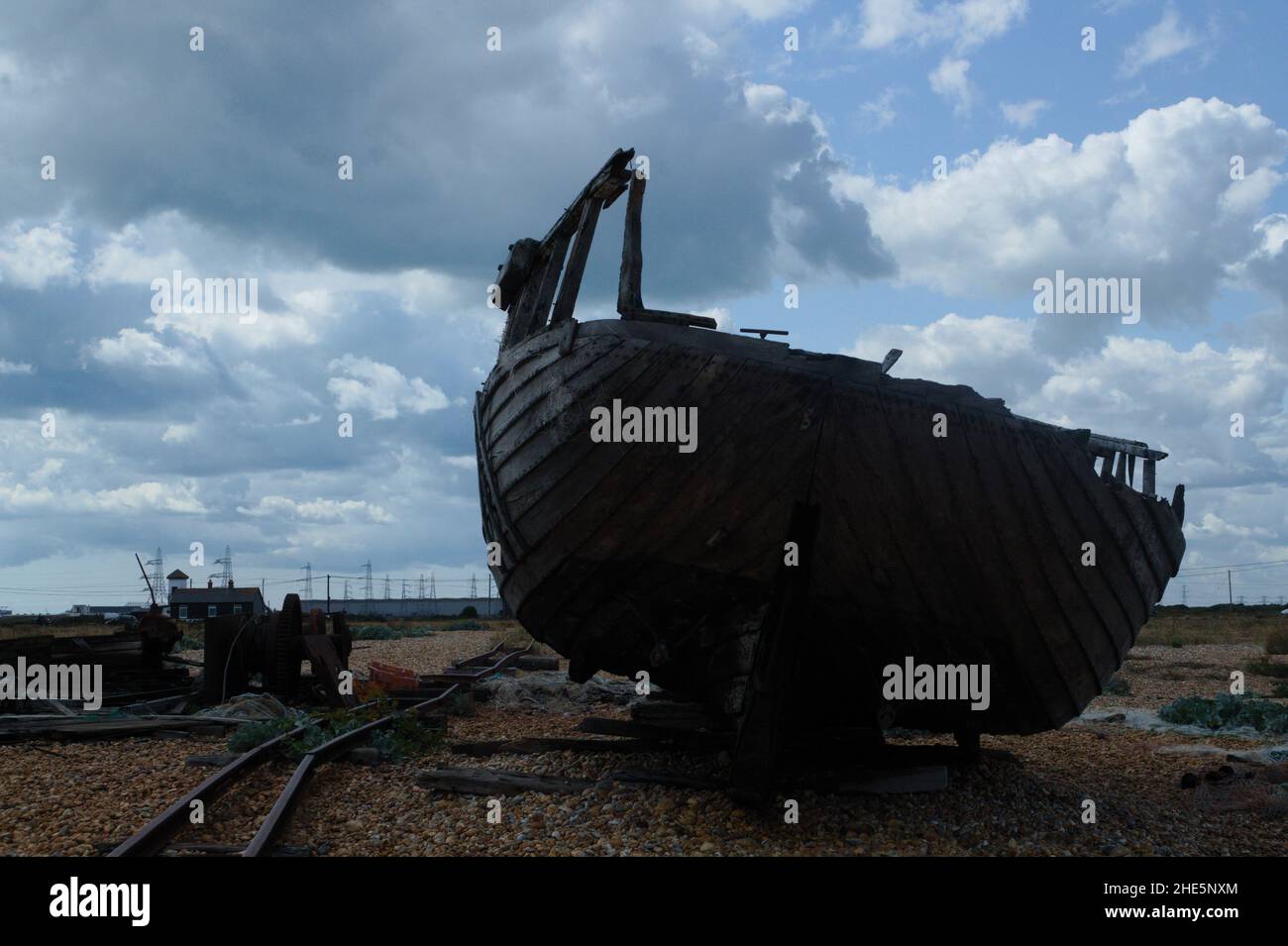 British Landscape - Wrecked Boat abandoned on a wild pebbled beach ...