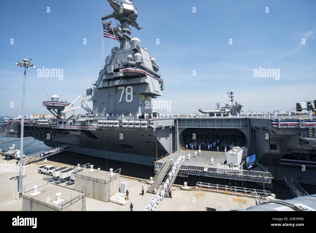 Sailors man the rails of the aircraft carrier USS Gerald R. Ford (CVN ...