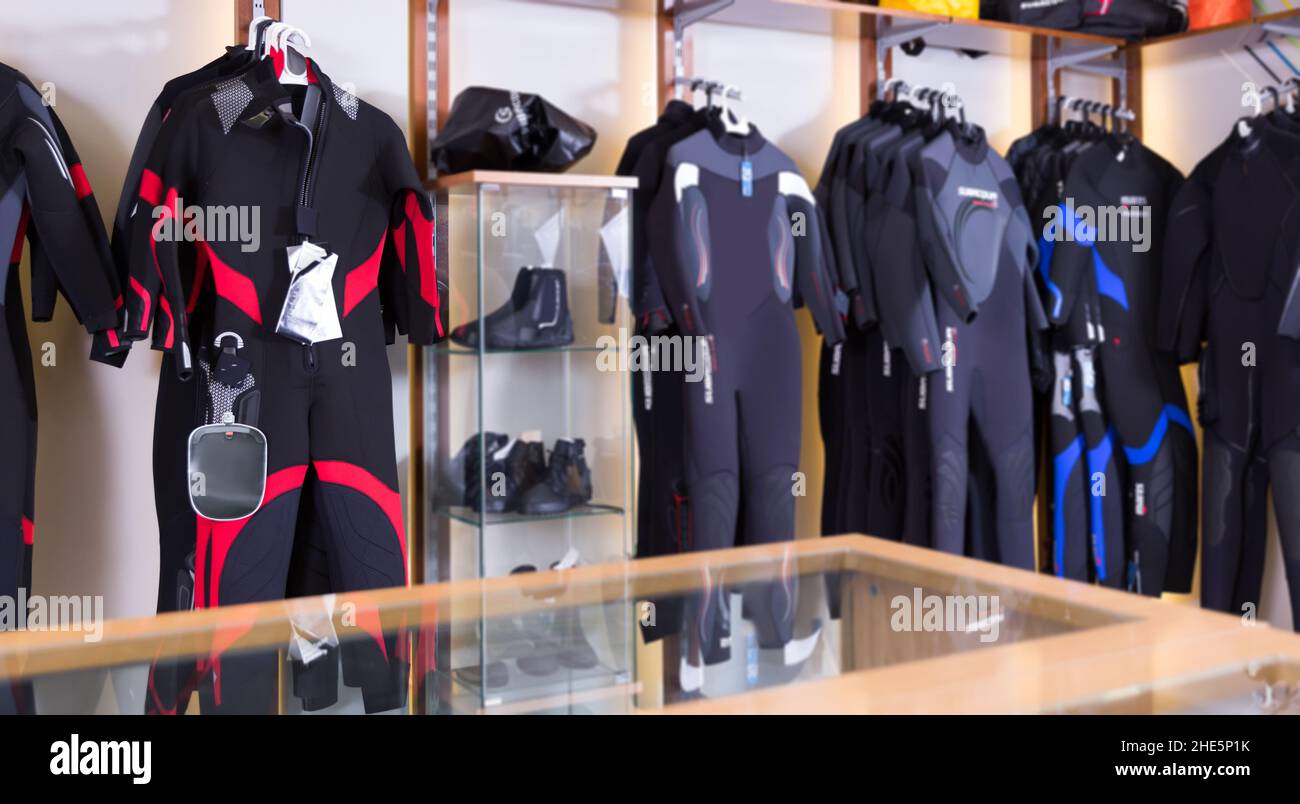 Picture of the underwater costumes for diving in store Stock Photo - Alamy