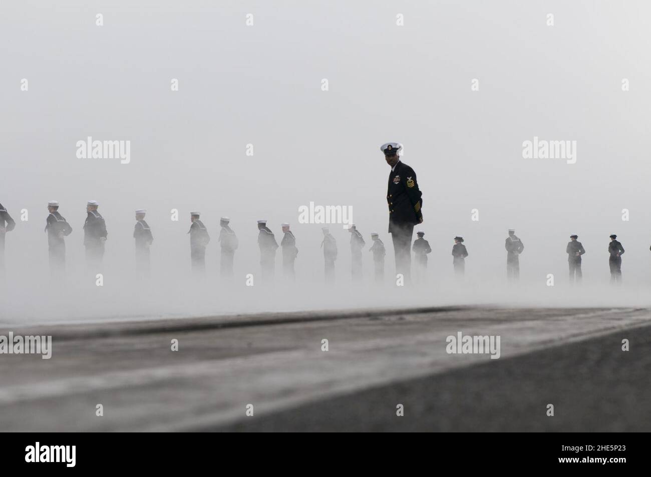 Sailors manning the rails in the mist. U.S. Navy Stock Photo - Alamy