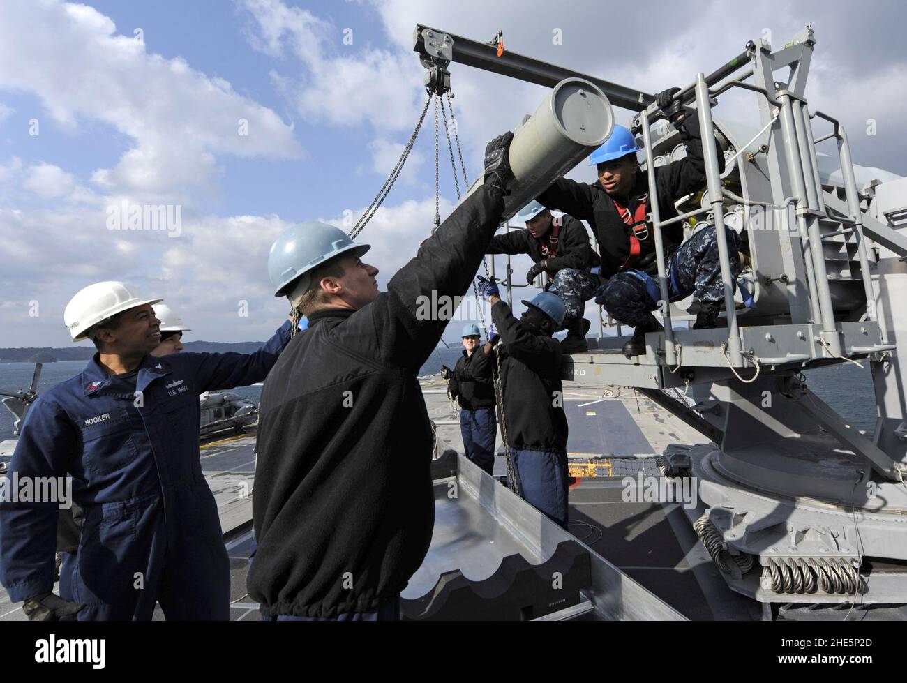 Sailors move a missile into storage. (8413081345 Stock Photo - Alamy