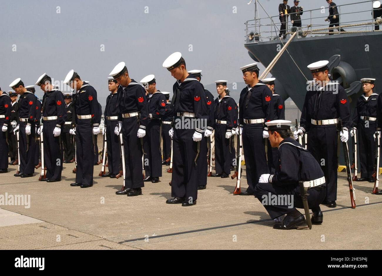 Sailors of JMSDF line up in formation at Sasebo, -16 Mar. 2002 c Stock ...