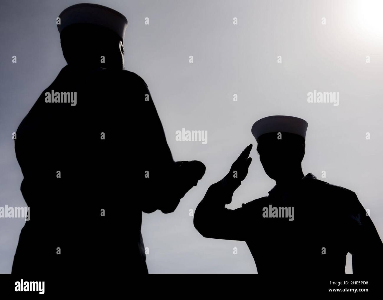 Sailors pass the American flag during “Old Glory” at retirement ...