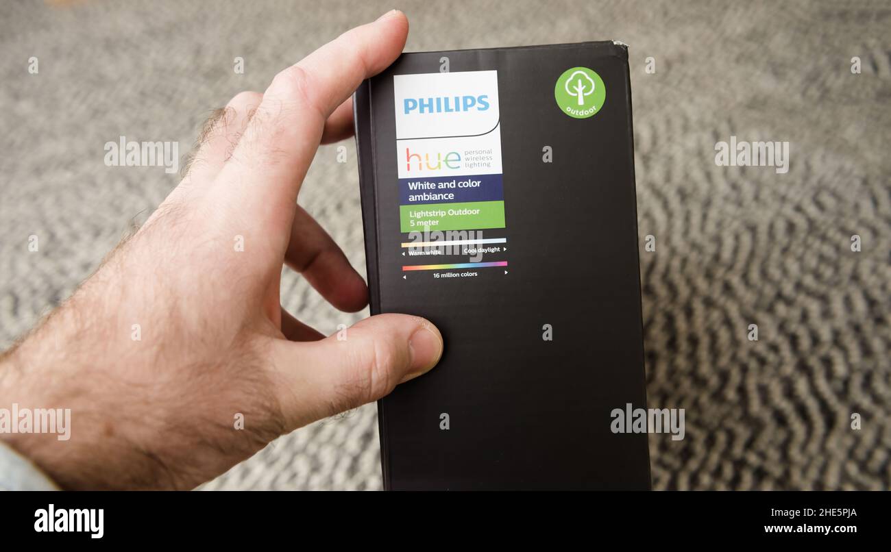 Paris, France - Nov 29, 2021: POV male hand holding package of Philips ...