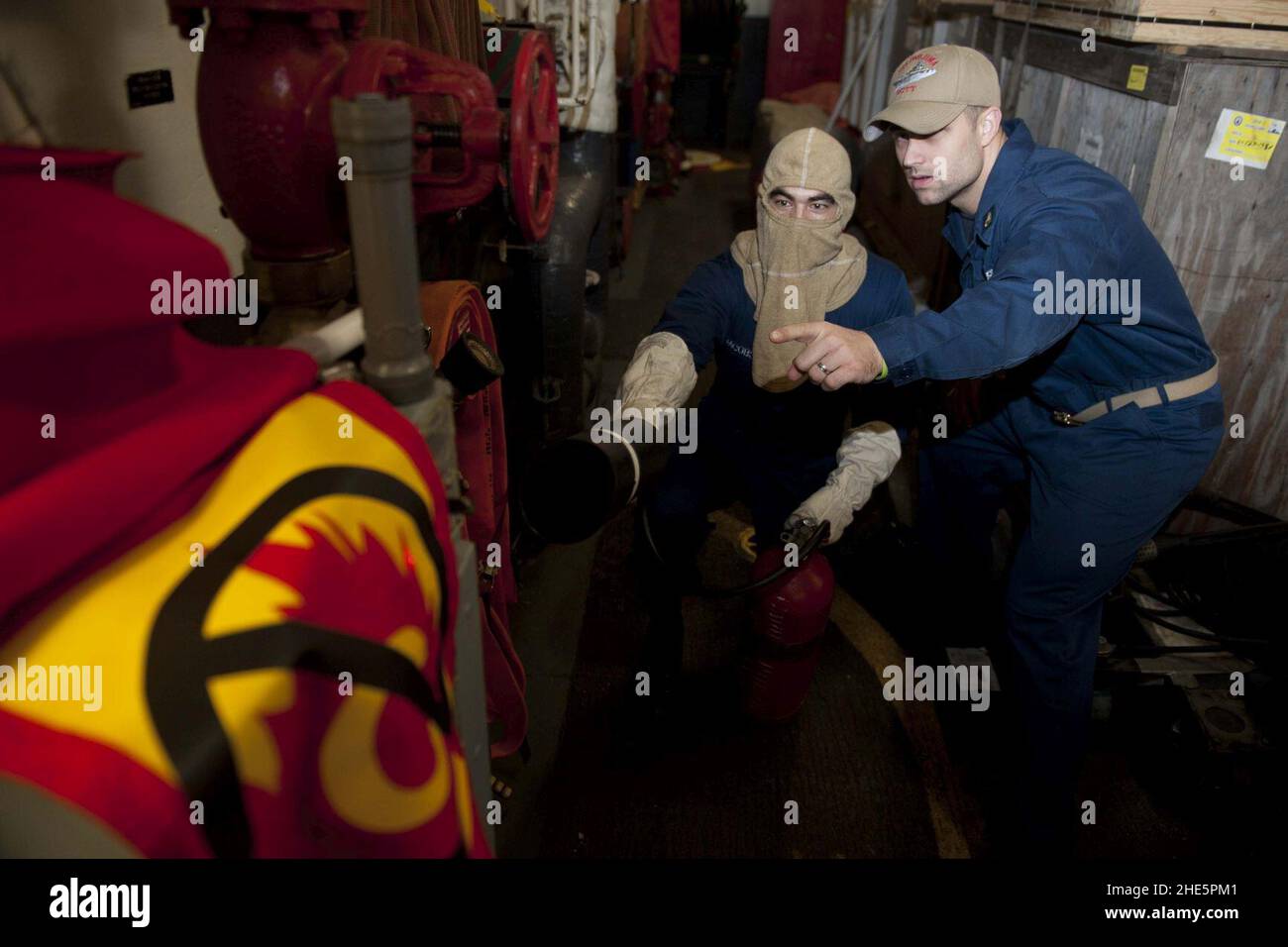 Sailors practice fire fighting at sea. (8223130855 Stock Photo - Alamy