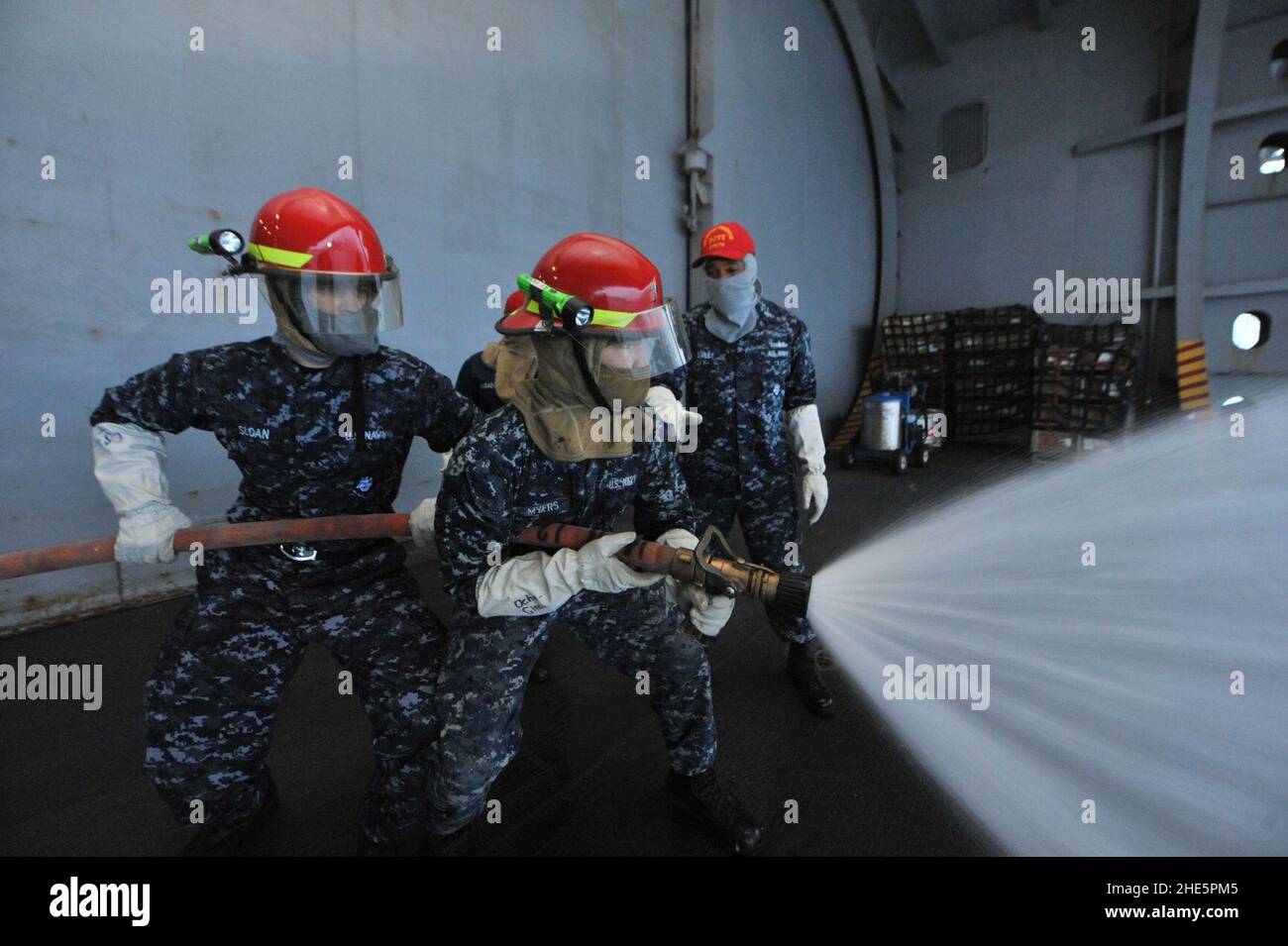 Fire hose handling hi-res stock photography and images - Alamy