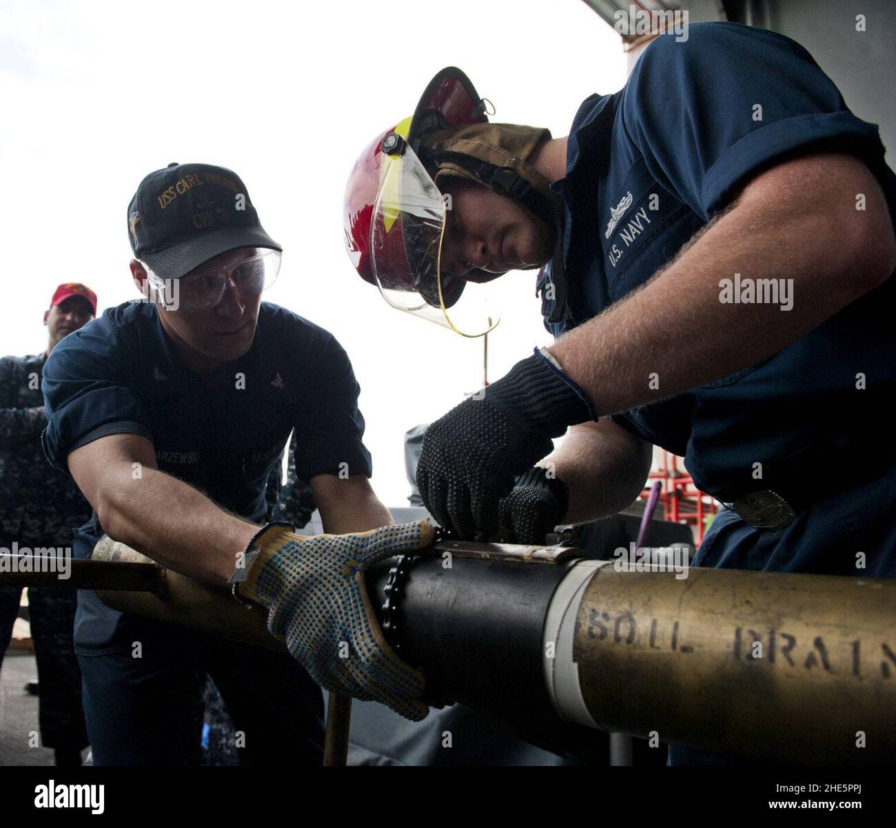 Sailors practice pipe patching aboard USS Carl Vinson. (8599729489 ...